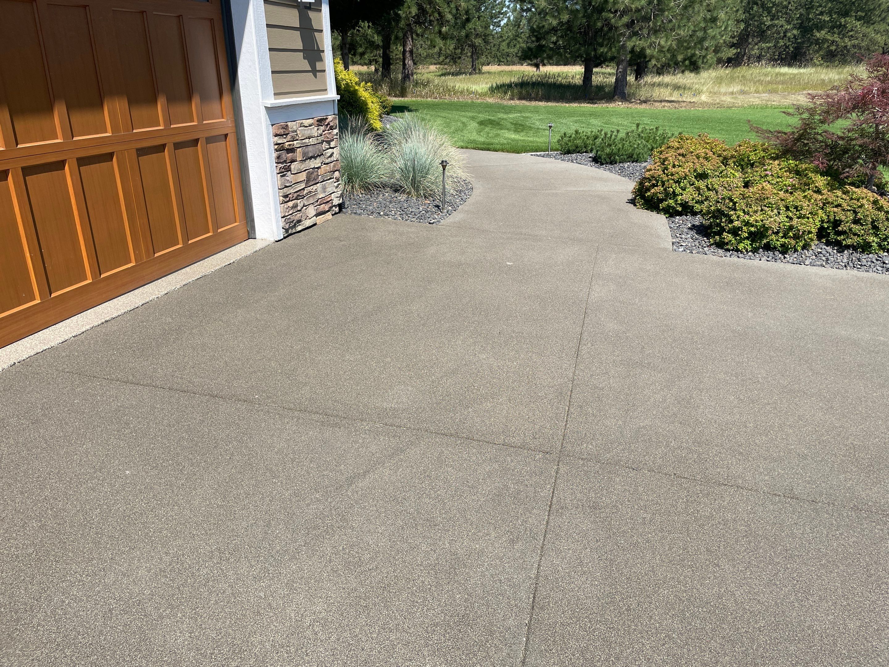 Textured Sand Coatings: A Driveway for Every Season | Concrete Craft